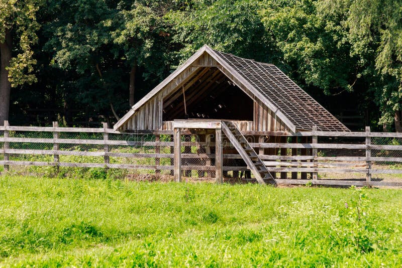 Rustic Wooden Hay Storage Building with an Attic. Barn Interior in the ...