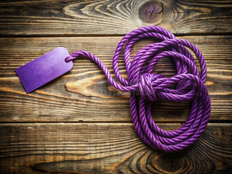 Rustic Wooden Surface with Violet Loop and White Label a Stunning ...