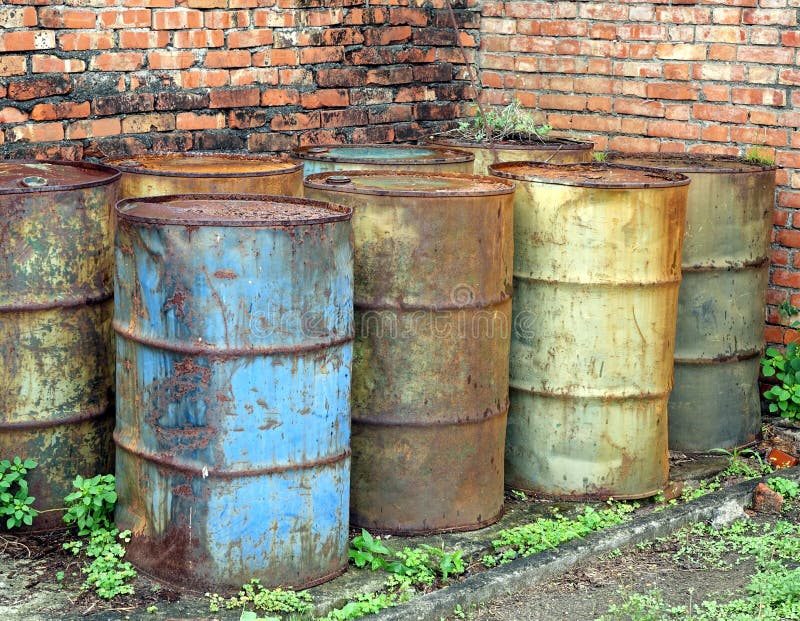 Rusting Oil Barrels stock image. Image of pollution, steel - 47232359