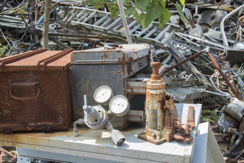 Rusting tools in junkyard stock photo. Image of rust - 94719464