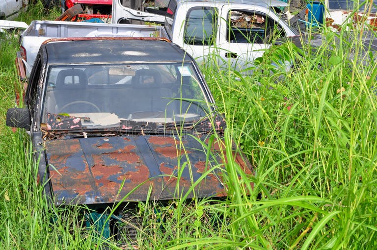 Rusty abandoned cars stock image. Image of untidy, vehicle - 98557027