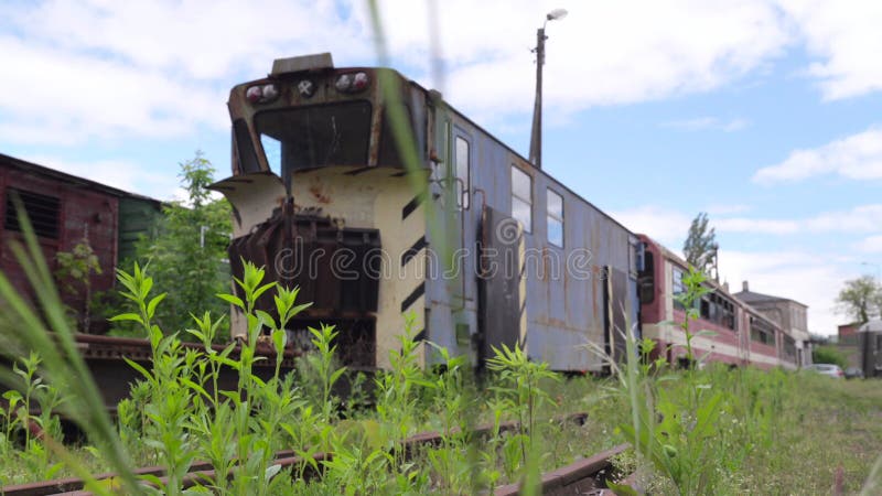 A Rusty Abandoned Train in an Overgrown Area. Life after the Apocalypse ...
