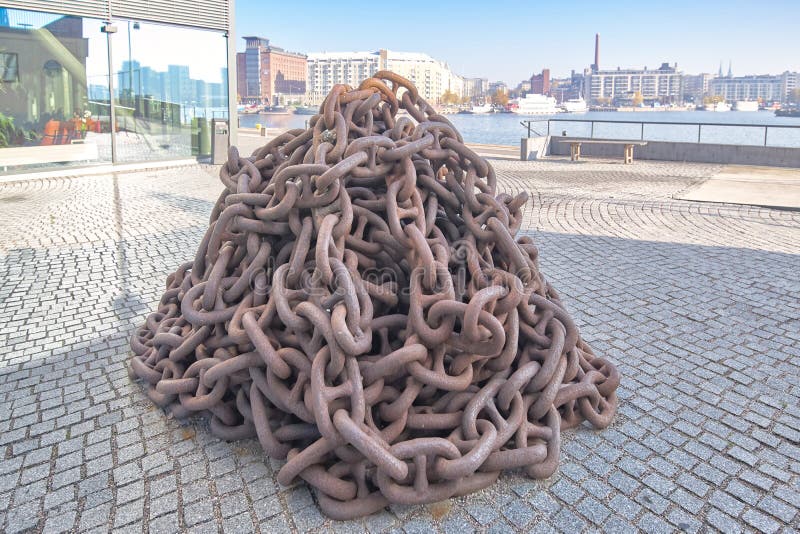 Rusty Anchor Chain Piled Up on the Pier, Close-up Stock Image - Image ...