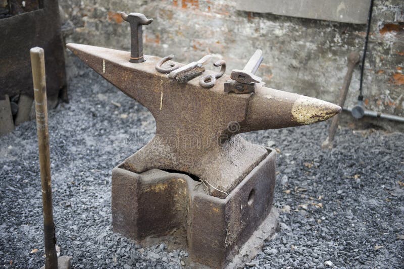 Rusty anvil in workshop stock image. Image of factory - 30515715