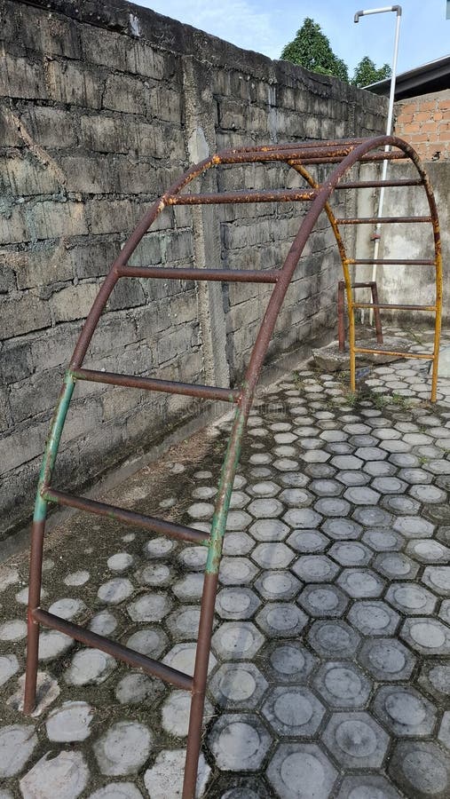 Rusty Arch Climbing Frame in an Abandoned Playground Stock Photo ...