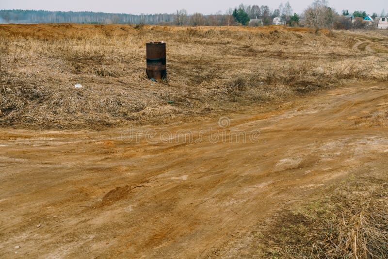 Rusty Barrel on Field stock image. Image of dump, economic - 97006237