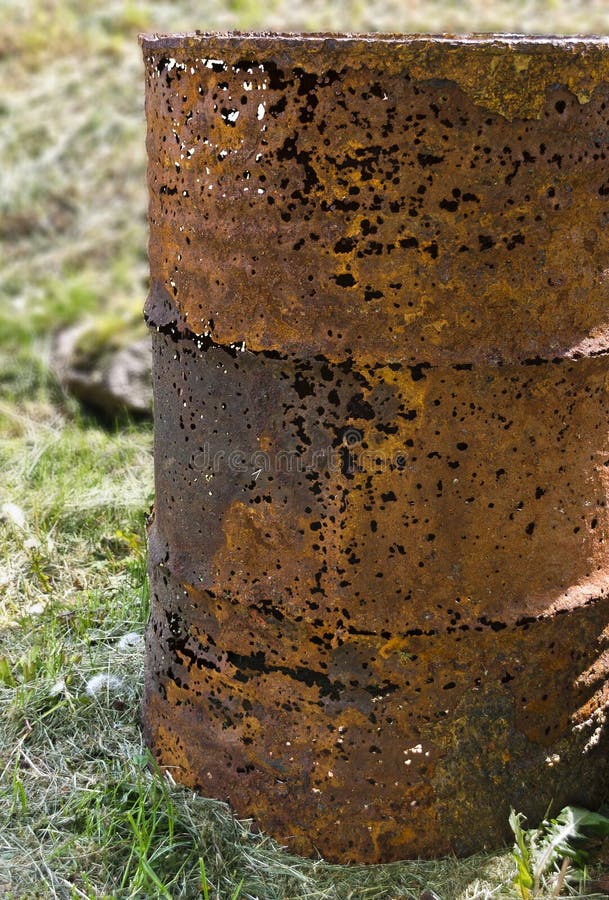 Rusty barrel with holes stock photo. Image of disposal - 56397586