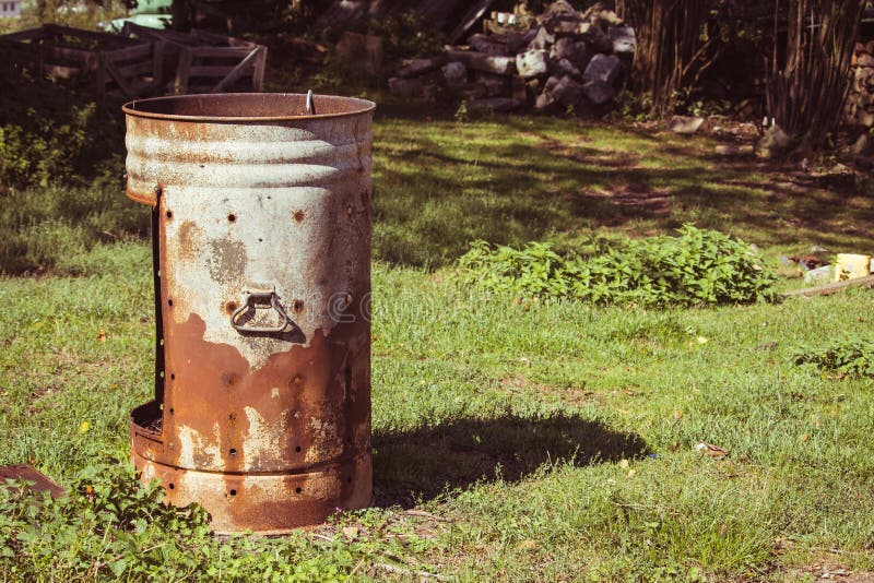 Rusty barrel in a park stock image. Image of rough, safety - 200217519