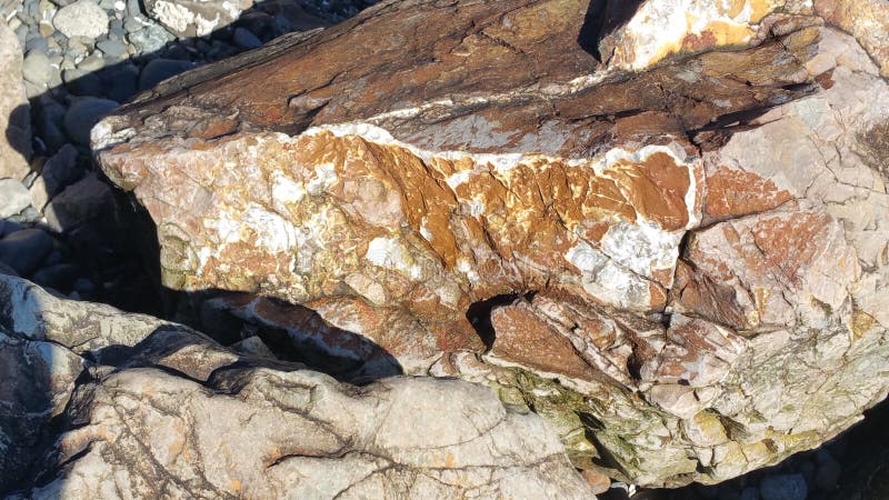 Rusty beach rock stock photo. Image of rocky, beautiful - 50537046