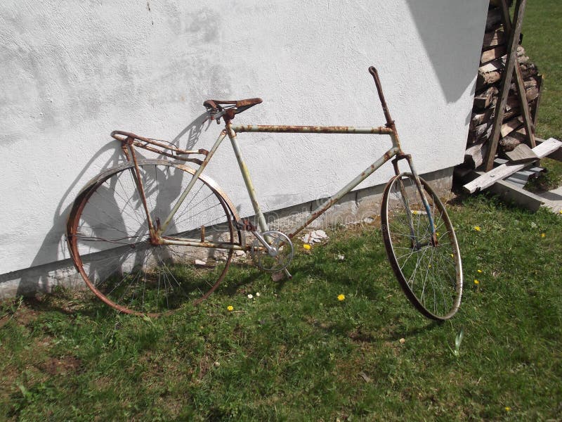 Old Wrecked Bicycle Lying Abandoned on Mud of River Bed. Stock Photo ...