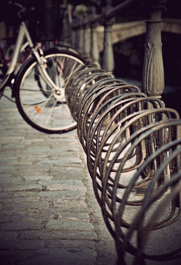 Rusty bicycle rack stock image. Image of public, tire - 23514709
