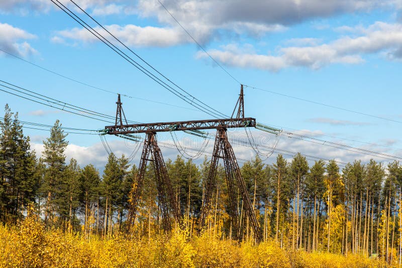 Rusty and Black Power Line is on the Blue Sky with White Clouds ...