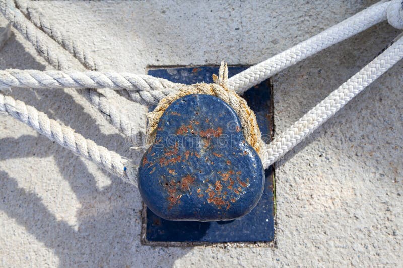 Rusty Blue Bollard Tied by White Ropes - Top View Background Stock ...