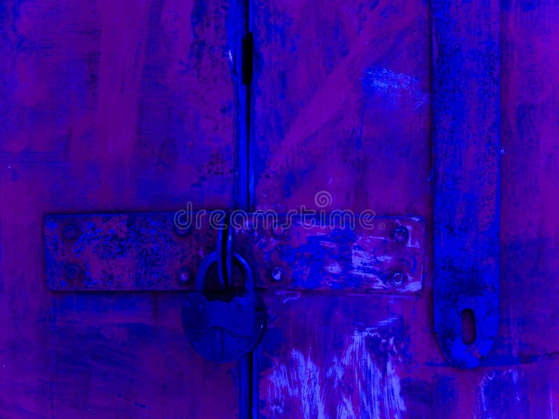 Rusty Blue Iron Gates Locked with a Large Padlock Stock Photo - Image ...