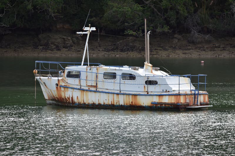 Rusty boat on calm water stock image. Image of hull, rust - 79340923
