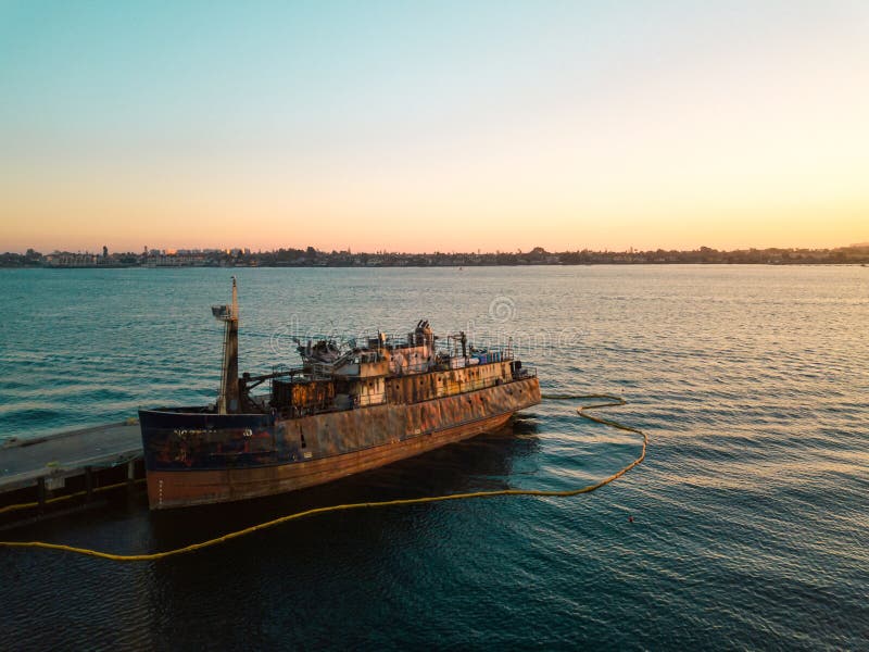 Rusty boat at sunset stock image. Image of scenic, broken - 116785253
