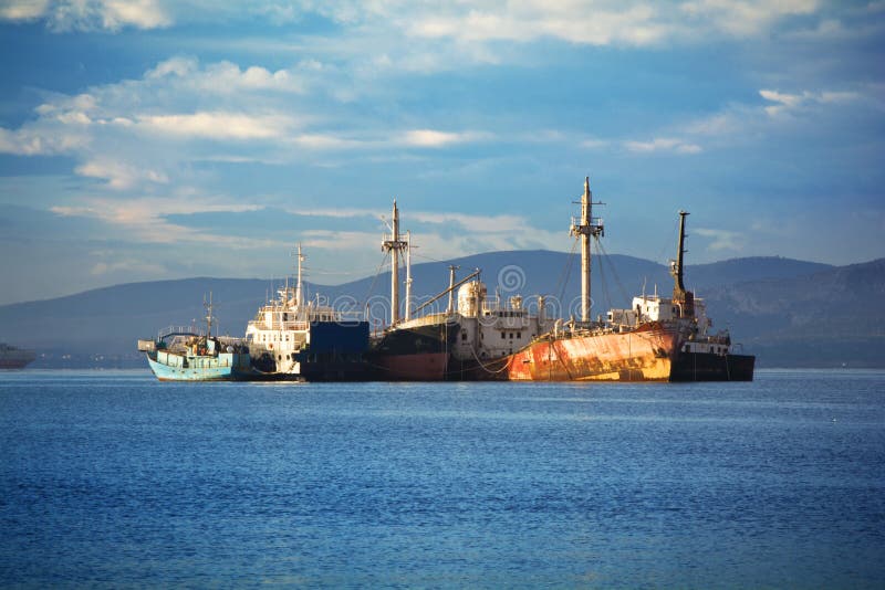Rusty old boats stock photo. Image of marsh, reflections - 7656110