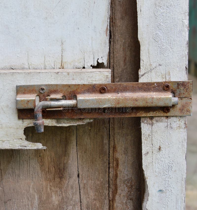 Rusty Bolt on Decay White Wooden Door Stock Image - Image of wooden ...