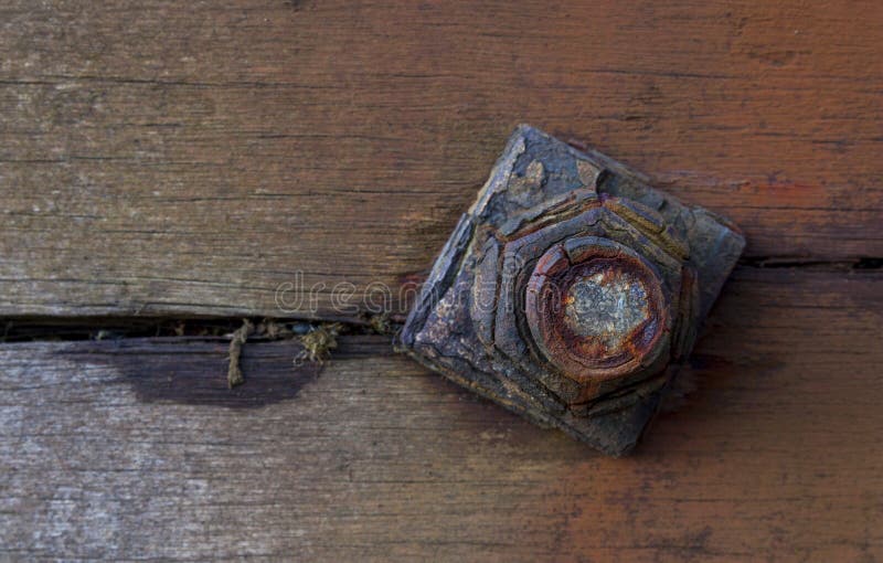 Rusty bolt through timber. stock image. Image of worn - 79061175