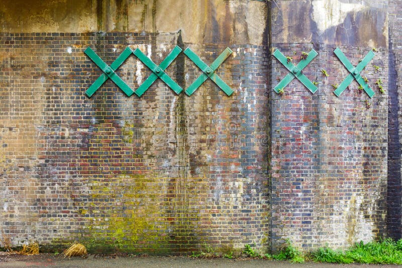 Rusty Brick Wall Under Railway Bridge in England Uk Stock Photo - Image ...