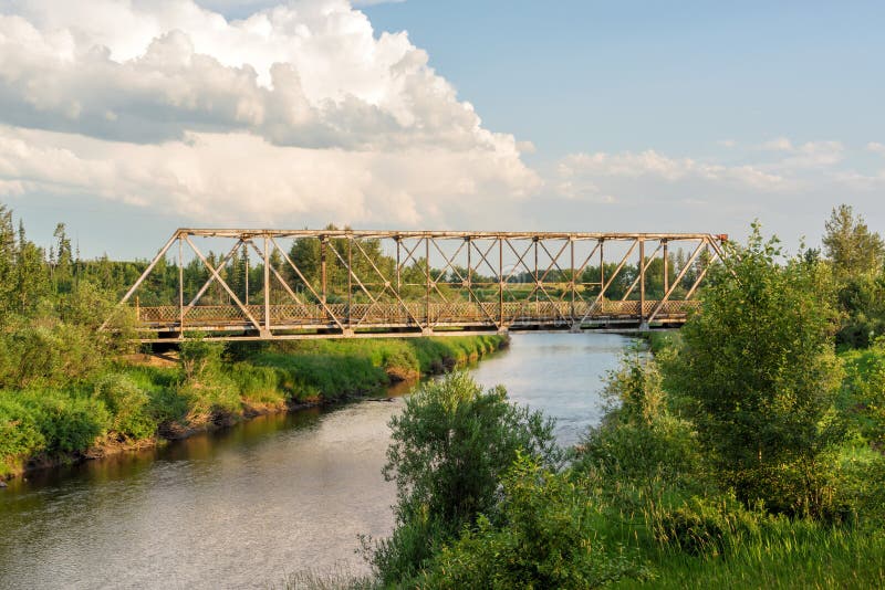 Rusty Bridge Over a Small Stream in Summer Stock Image - Image of small ...