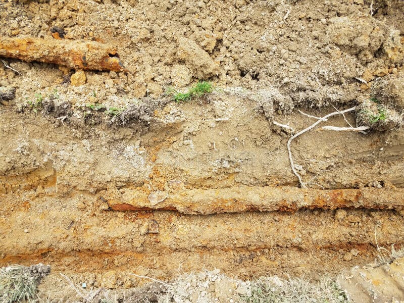 Rusty and Broken Sewer Pipe with Digging and Dirt Pile Stock Photo ...