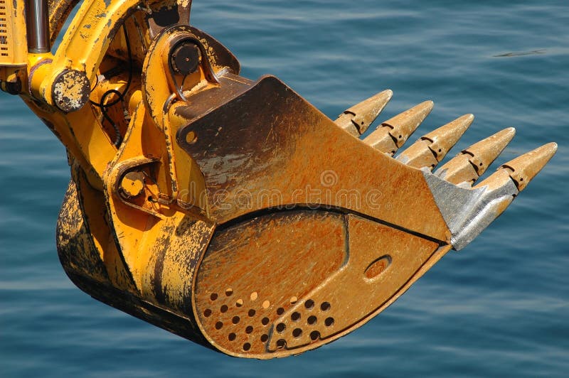 Rusty Bulldozer Scoop Over Water Stock Image - Image of bulldozer ...