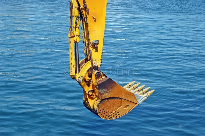 Rusty Bulldozer Scoop Over Water Stock Image - Image of bulldozer ...