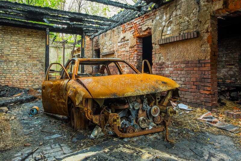 Rusty and burnt car wreck stock image. Image of fire - 54709025