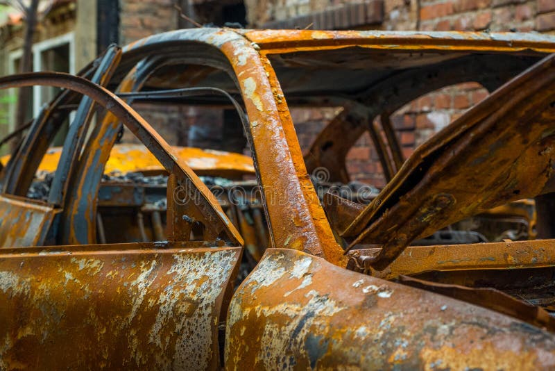 Rusty and burnt car wreck stock image. Image of fire - 54709025