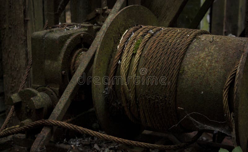 Rusty Cable Drum and Winch Mechanism Covered in Moss and Decay Stock ...