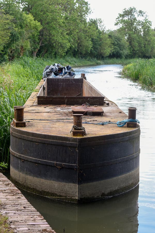 Rusty Canal Transport Boat Disused and Abandoned by the Tow Path Stock ...