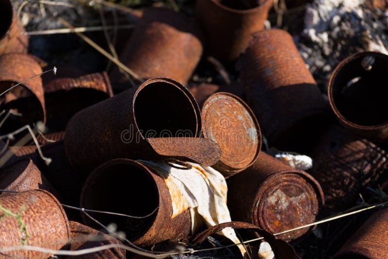 Rusty cans stock photo. Image of countryside, cans, amount - 44575472