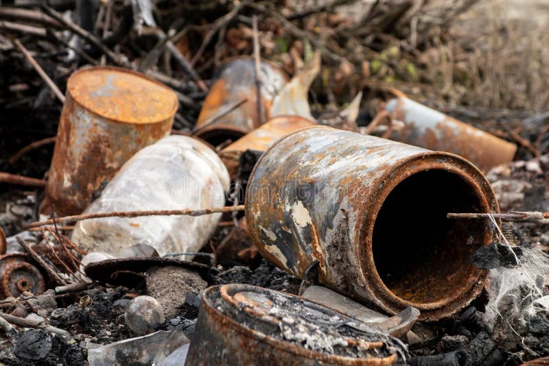 A Rusty Cans Which Were Pressed Down, Burned and Thrown Away As Ecology ...