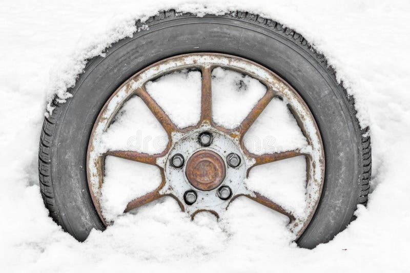 Rusty Car Wheel Partially Covered in Snow Capturing Winter S Harsh ...
