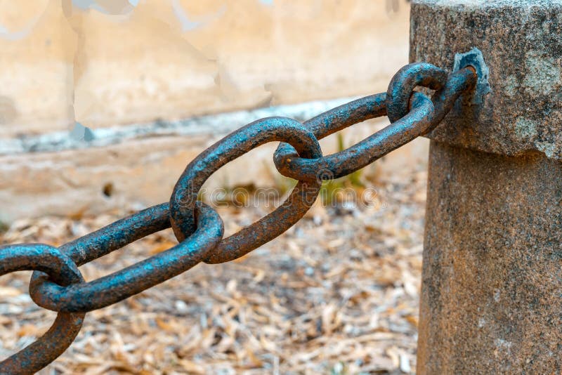 Rusty Chain Attached To a Rock Stock Image - Image of building ...