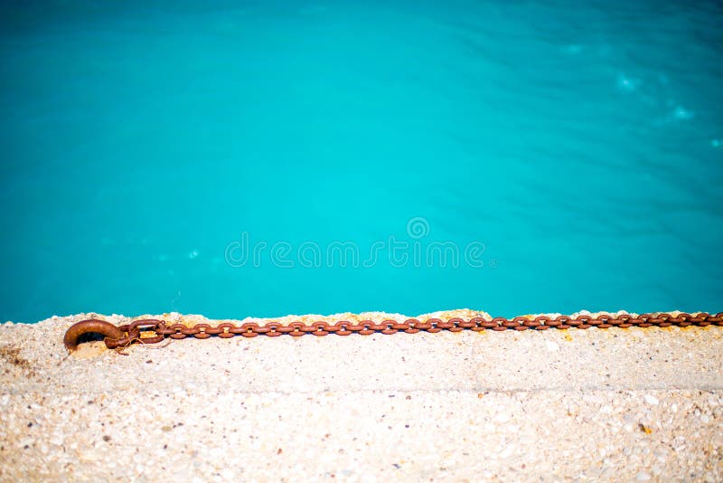 Rusty Chain on the Concrete with Water Stock Photo - Image of iron ...