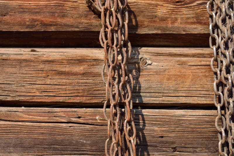 Rusty Chain Hanging on Wooden Wall Stock Image - Image of design ...