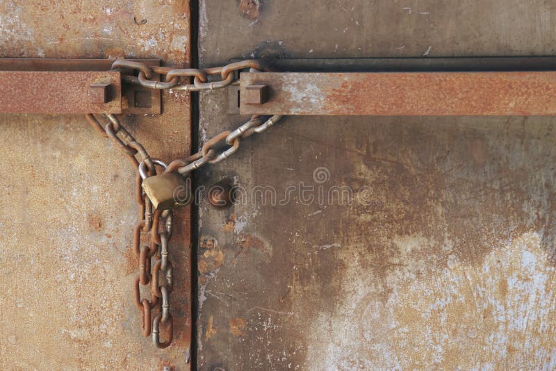 Rusty Chain with Lock on Metal Double Doors Stock Image - Image of ...