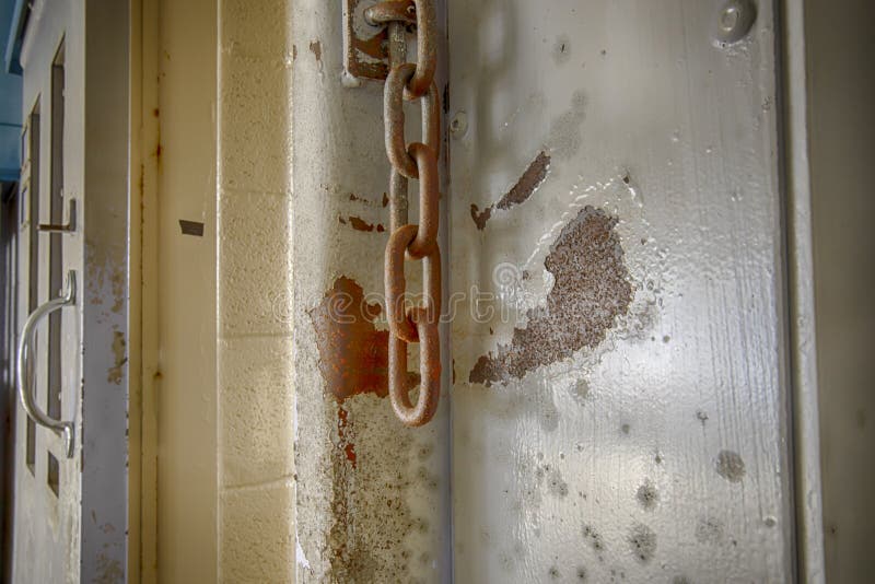Chains on prison cell door stock image. Image of penalty - 118090961