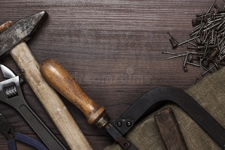 Rusty Construction Instruments on the Wooden Stock Photo - Image of ...