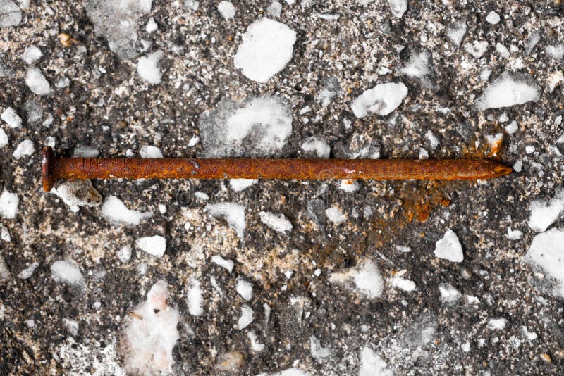 A rusty big and long nail. stock image. Image of macro - 170452231