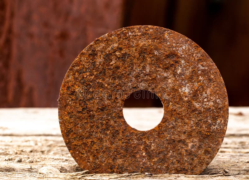 Rusty Disk on a Wooden Board Stock Image - Image of tool, steel: 171331197