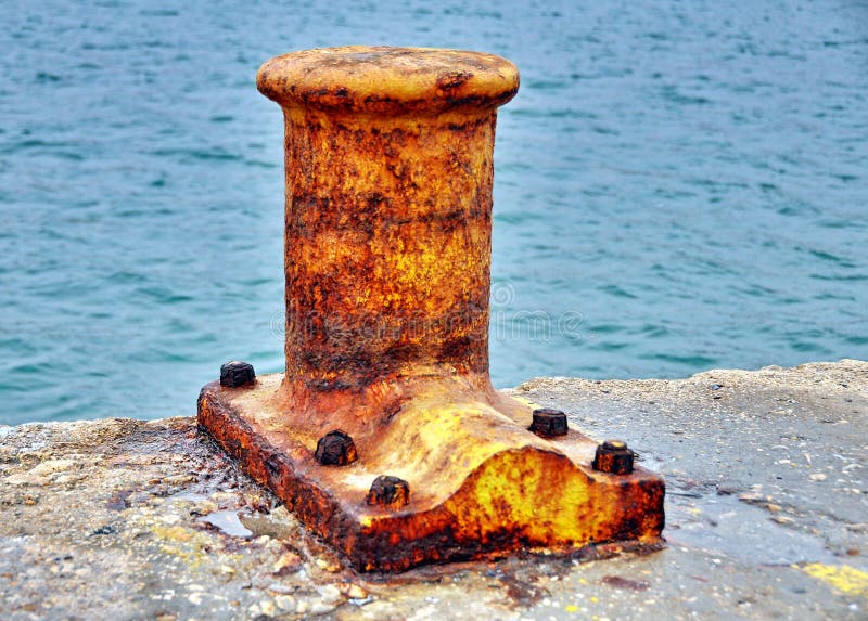 Rusty dock bollard stock photo. Image of dosk, colours - 52388038