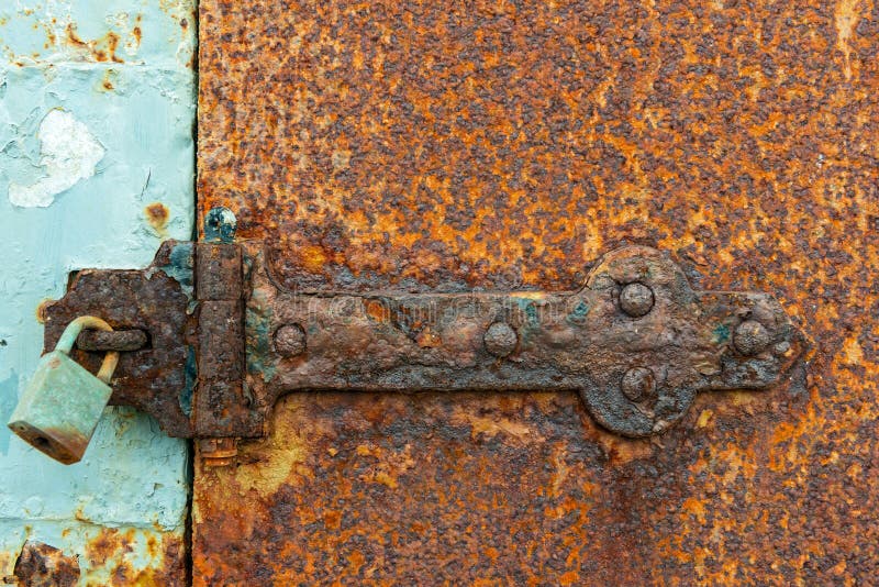 Rusty Door Bolt with a Padlock Close Up Stock Photo - Image of cellar ...