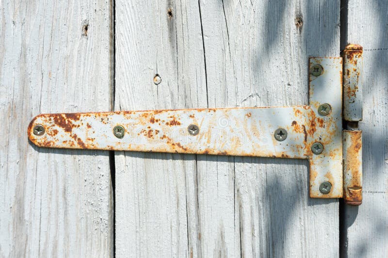 Rusty Door Hinge on a Wooden Door Stock Image - Image of wood, wall ...