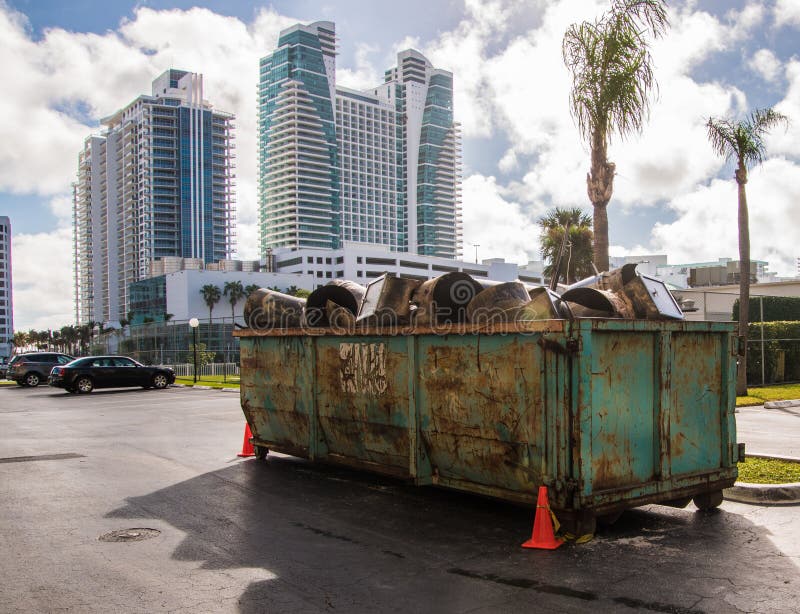 Old Rusty Dumpster on a City Street Construction Site Stock Photo ...