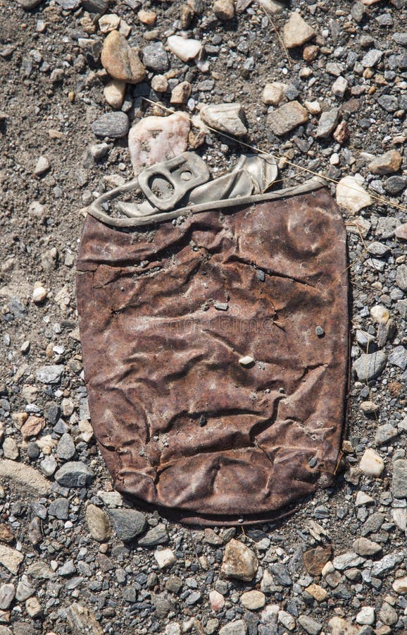 Rusty Flattened Soda Can Discarted in Nature Stock Image - Image of ...