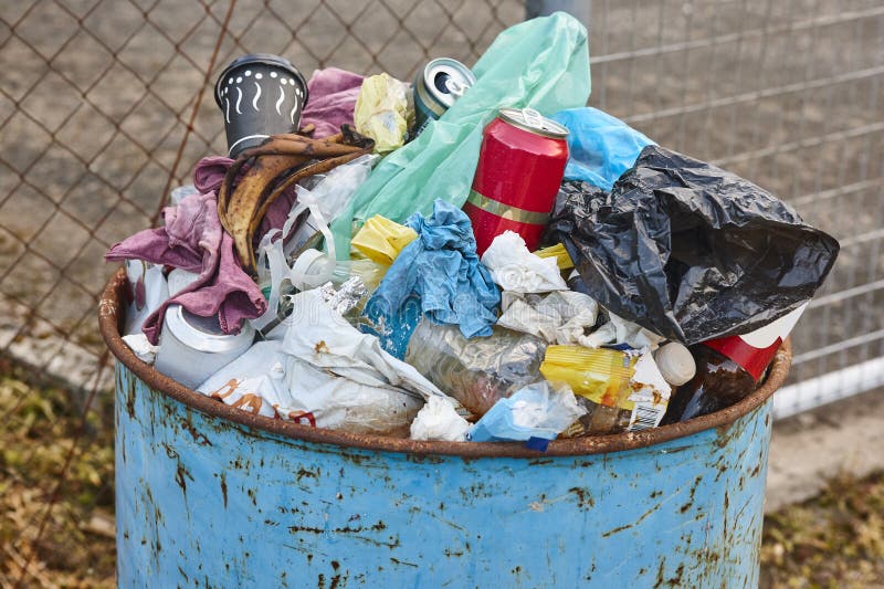 Rusty Garbage Can Full of Waste. Trash Management. Environment ...
