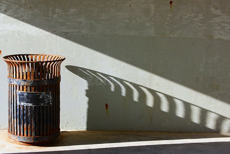 Rusty Garbage Can in Underpass Stock Photo - Image of building ...